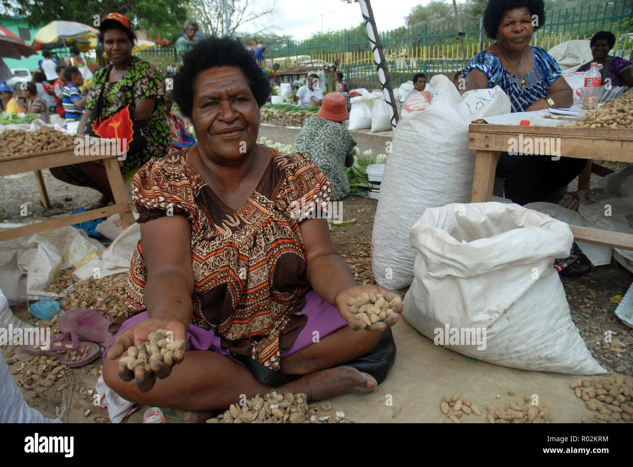 Lady selling peanuts at Boroko market, Port Moresby, Papua New Guinea ...