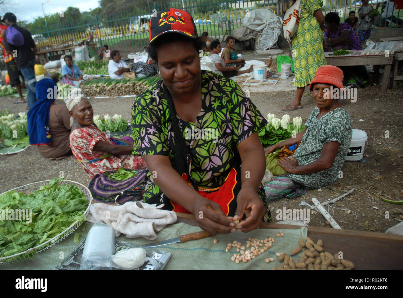 Girl selling peanuts hi-res stock photography and images - Alamy