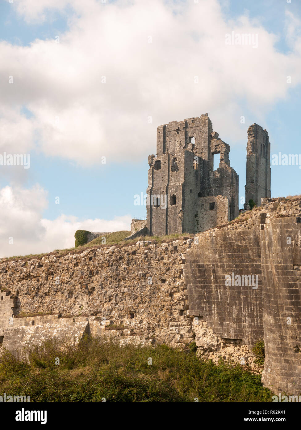 beautiful corfe castle dorset daytime summer light blue sky castle ...