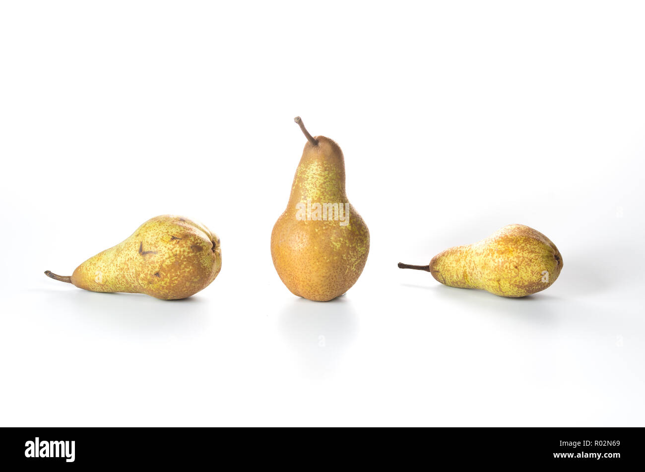 Three pears on a white background. Isolated pears Bera. Front view ...