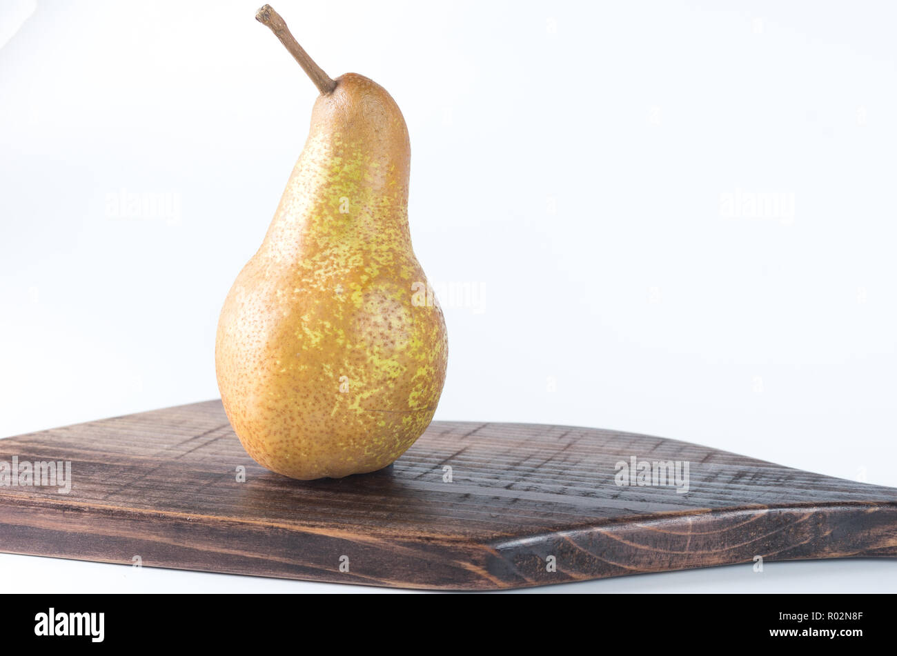 One pear on a white background. Pear isolate. Front view Stock Photo ...