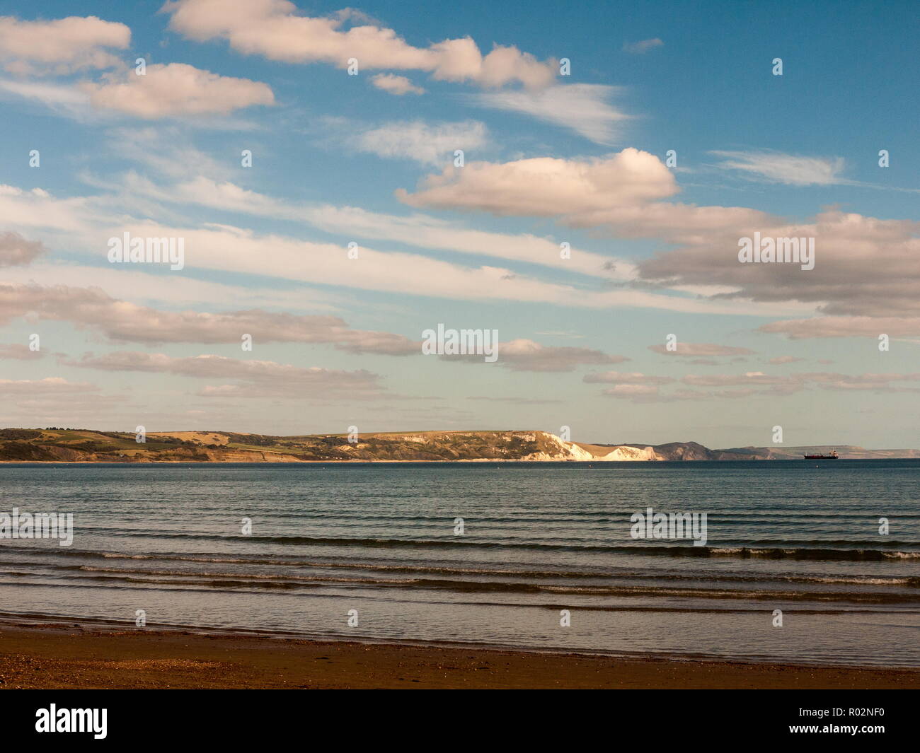 Weymouth beach dorset waves ocean water cliff tops white landscape open ...