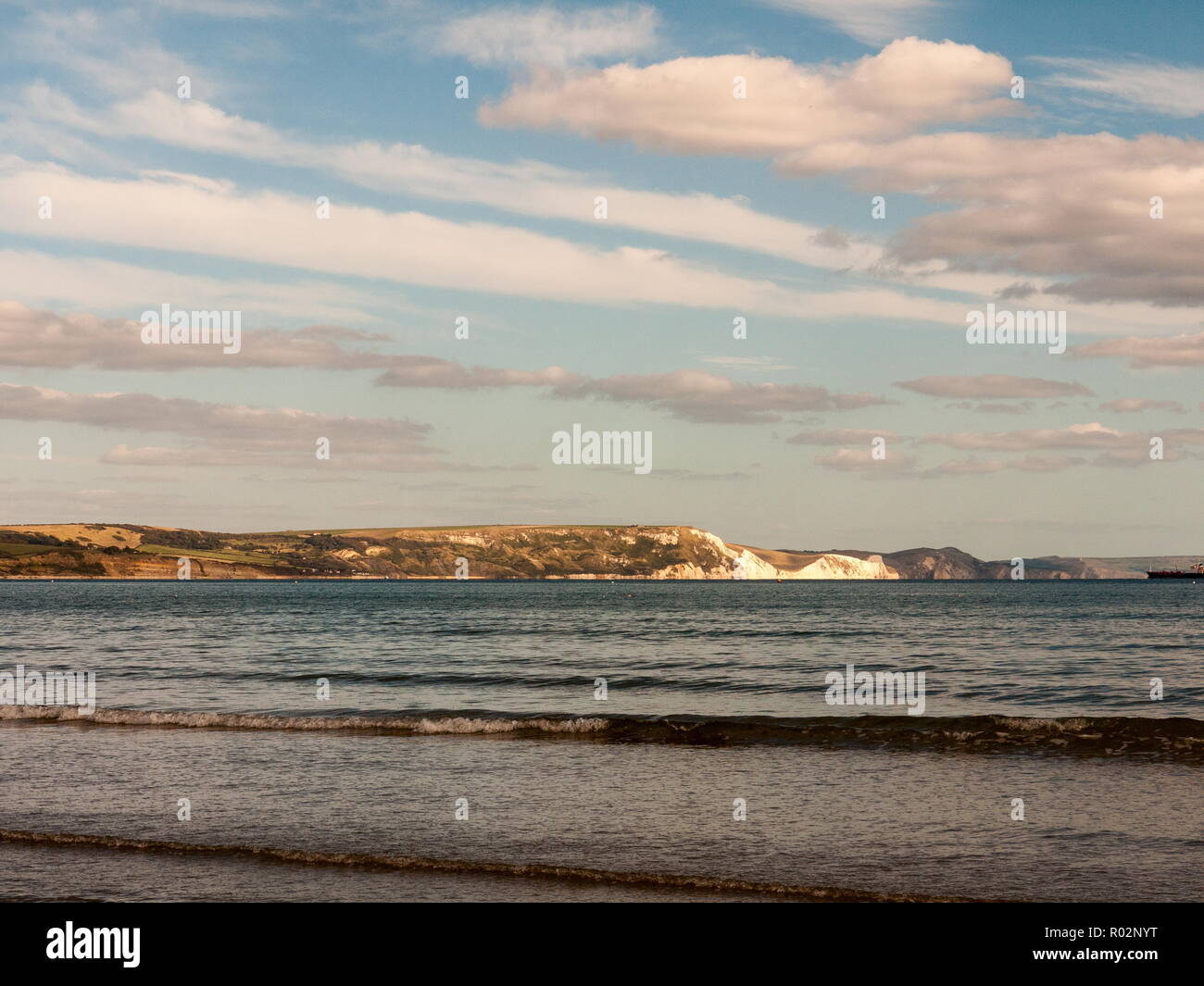 Weymouth beach dorset waves ocean water cliff tops white landscape open ...