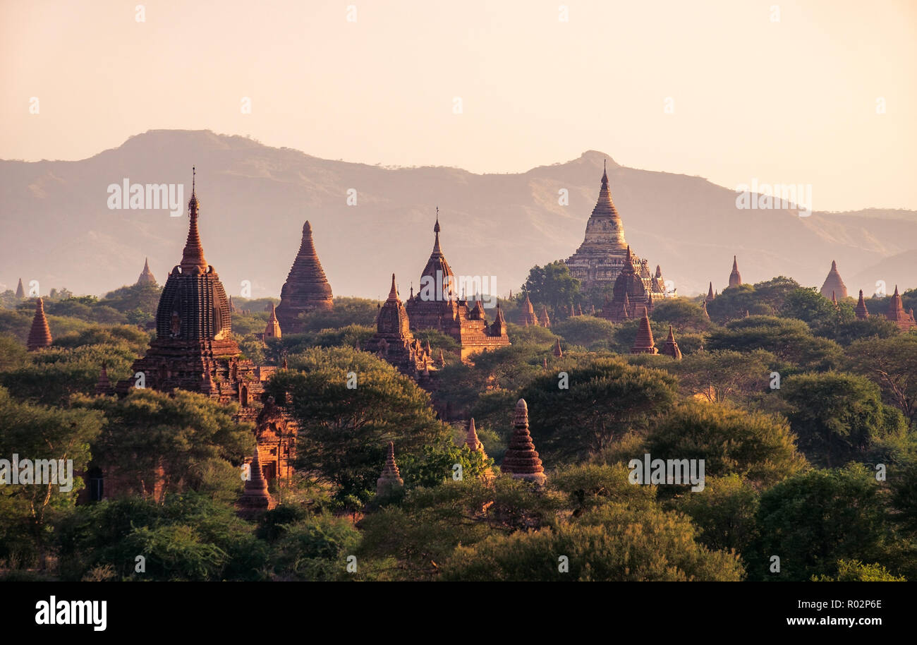 Landscape view of ancient temples at colorful golden sunset, Bagan ...