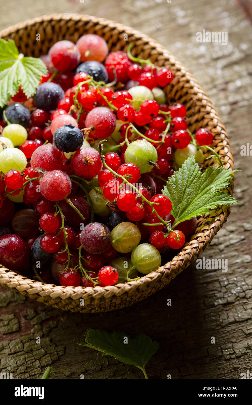 Summer berry mix in basket Stock Photo - Alamy
