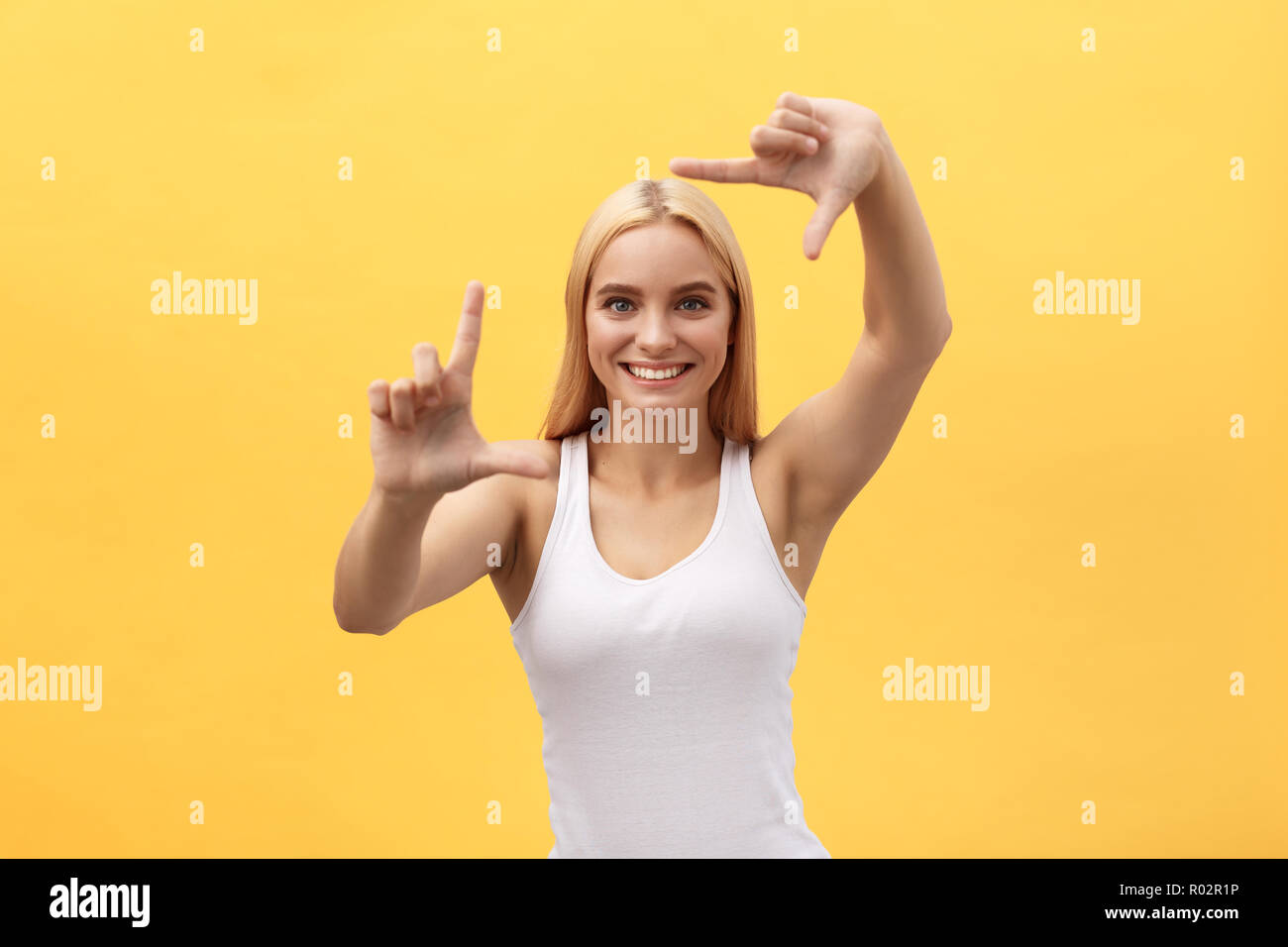 Woman making frame with fingers hi-res stock photography and images - Alamy
