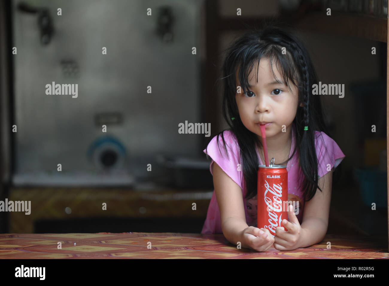 Drinking coca cola girl hi-res stock photography and images - Alamy