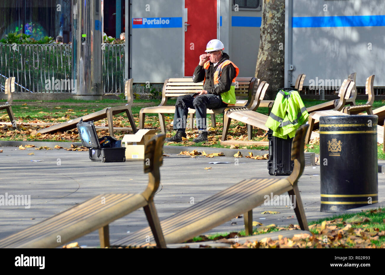 Workman having a rest in Leicester Square during replacement of the ...