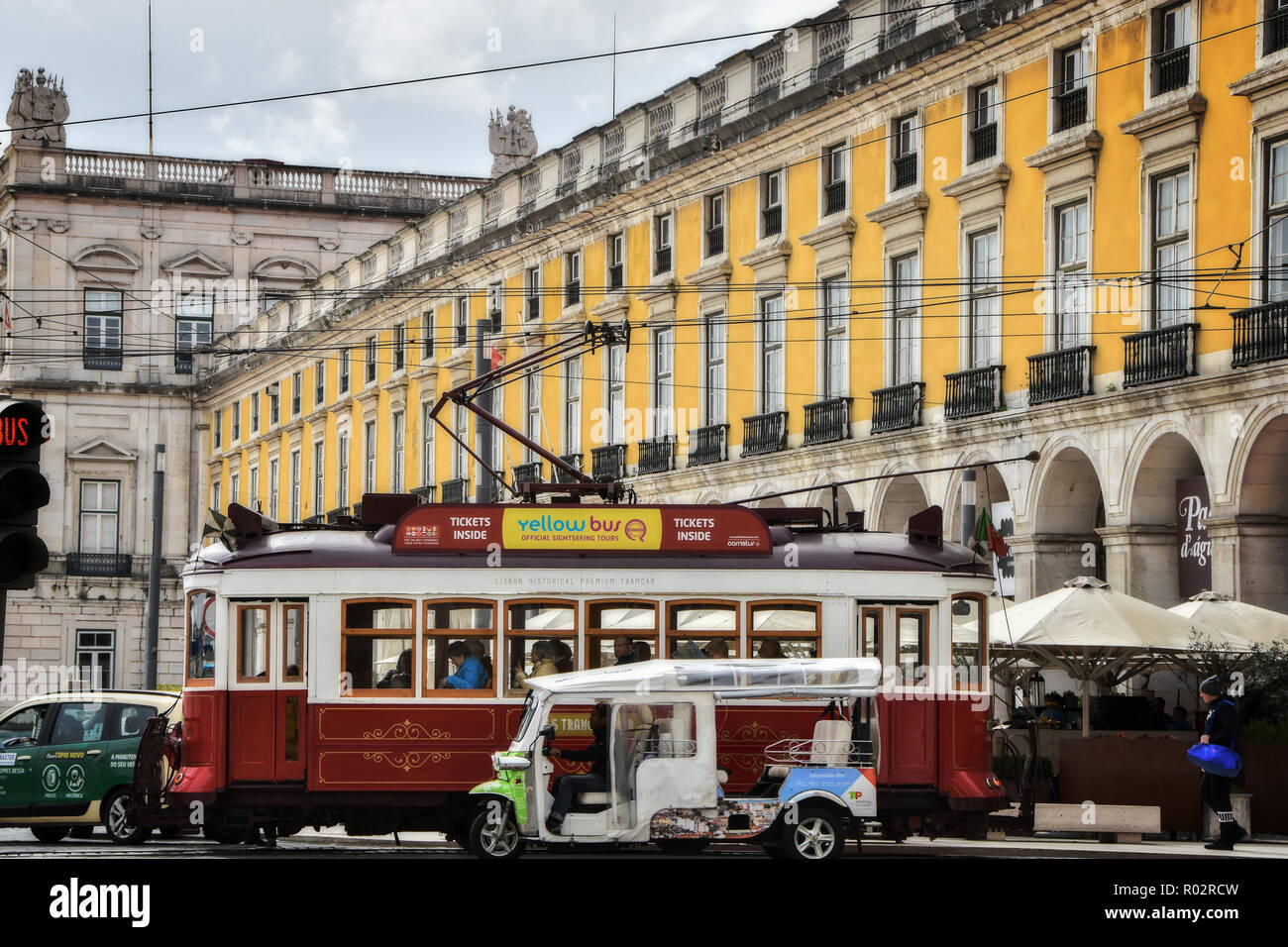 Old style tram in the centre of Lisbon Stock Photo - Alamy