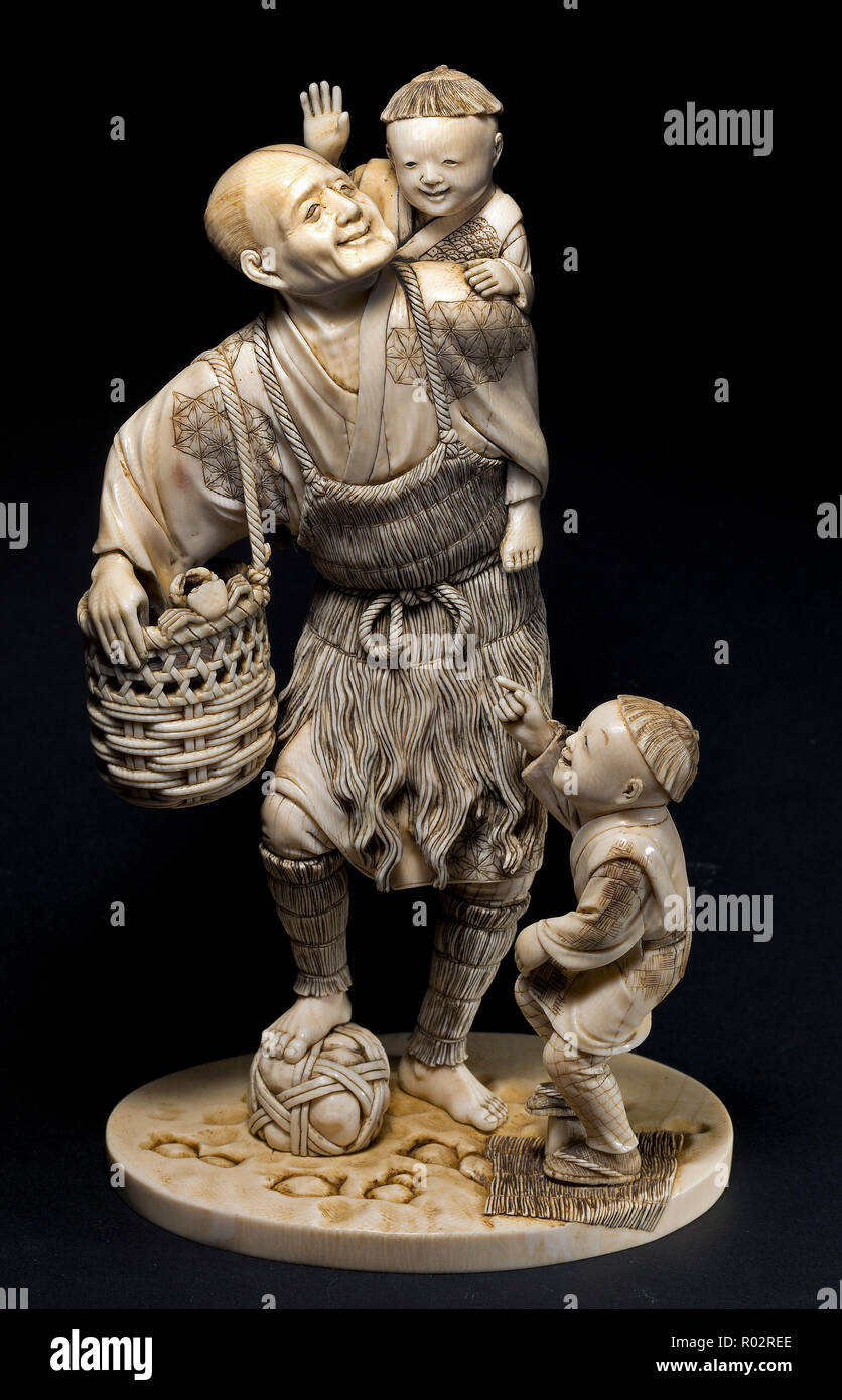 Ivory japanese okimono on black background Stock Photo - Alamy