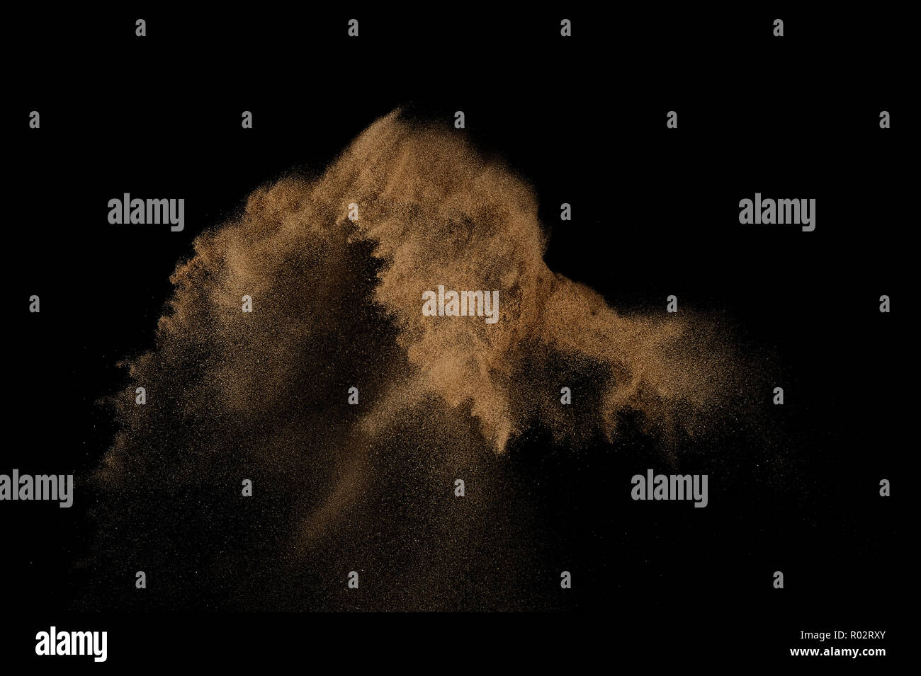 Sandy explosion isolated on black background. Abstract sand cloud Stock ...