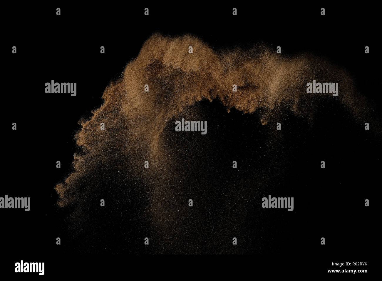 Sandy explosion isolated on black background. Abstract sand cloud Stock ...