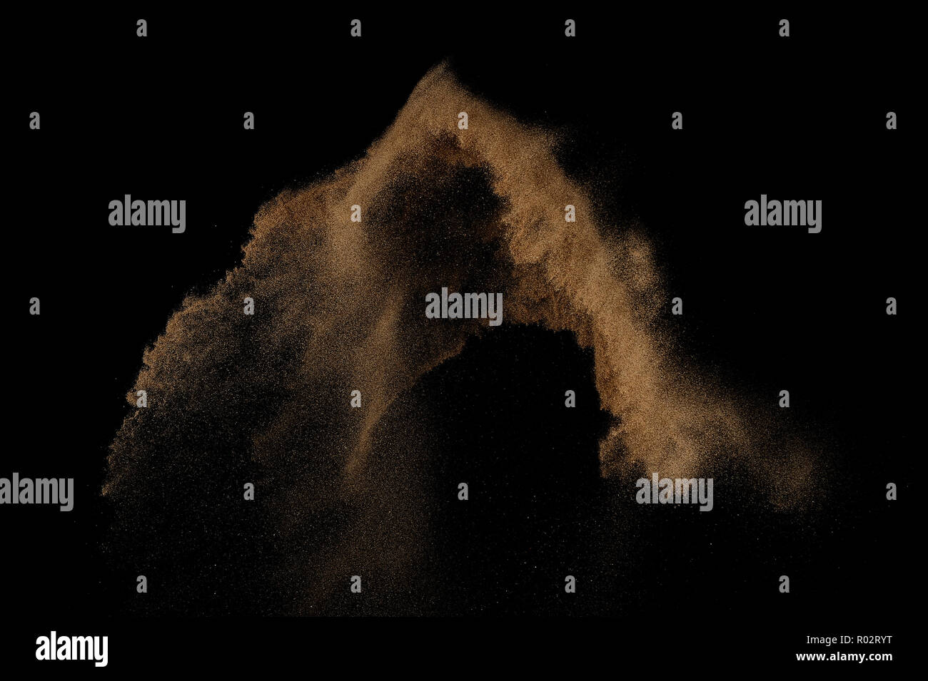 Sandy explosion isolated on black background. Abstract sand cloud Stock ...