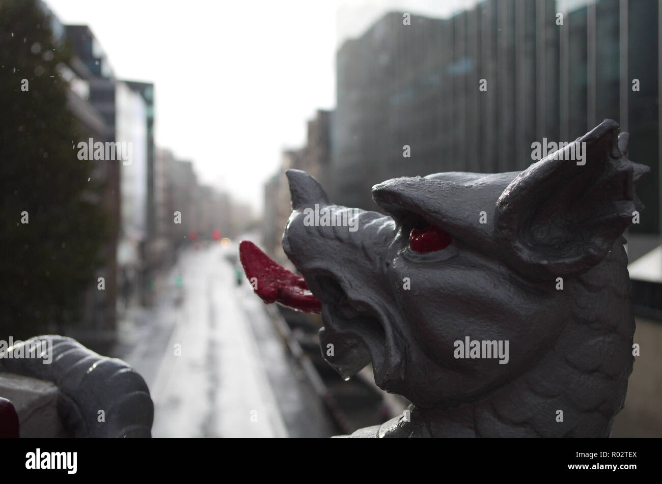 Red tongue evil creature, London, UK Stock Photo - Alamy