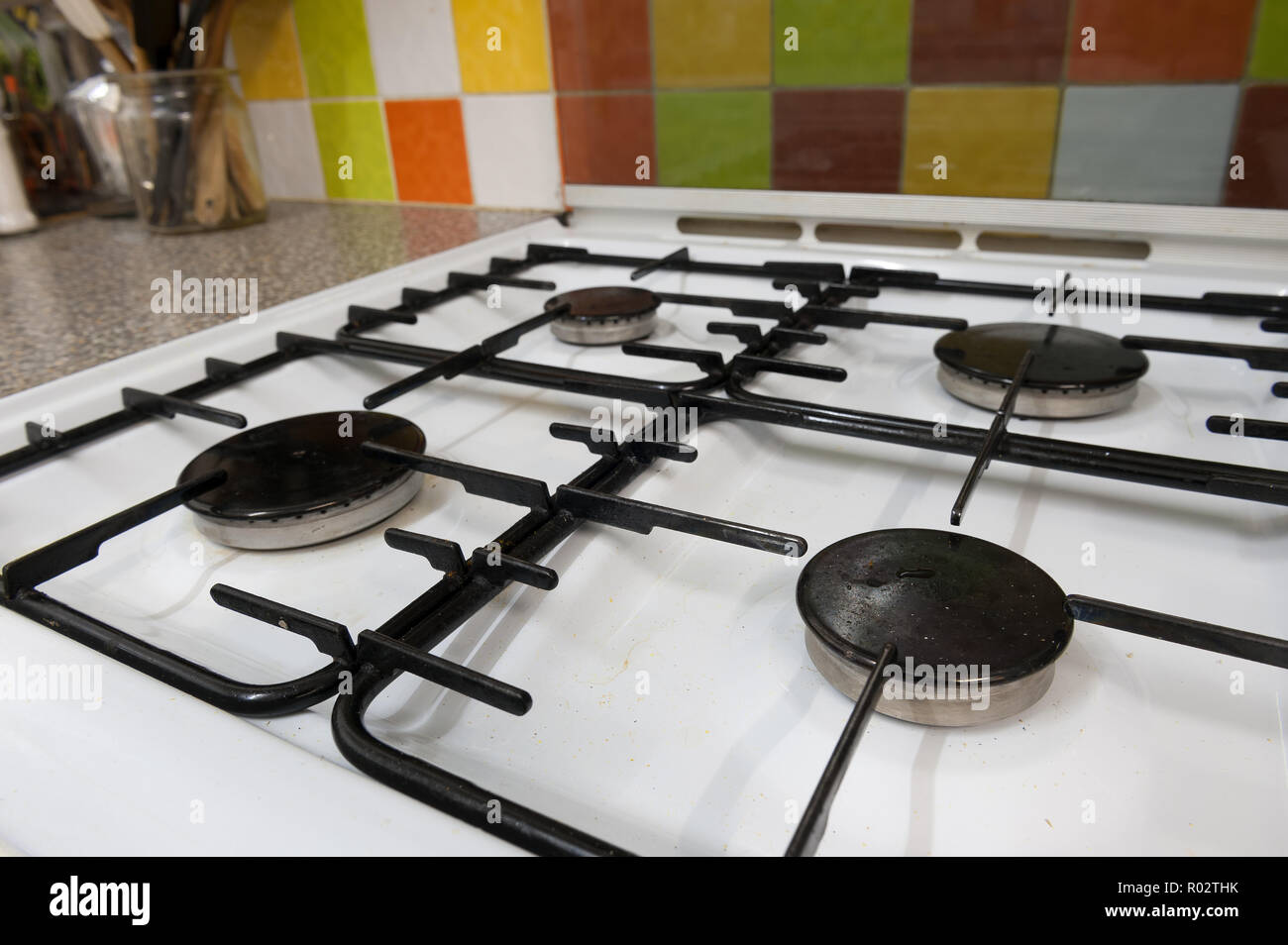 What at first glance a clean gas cooker reveals dirt, splattered oil ...