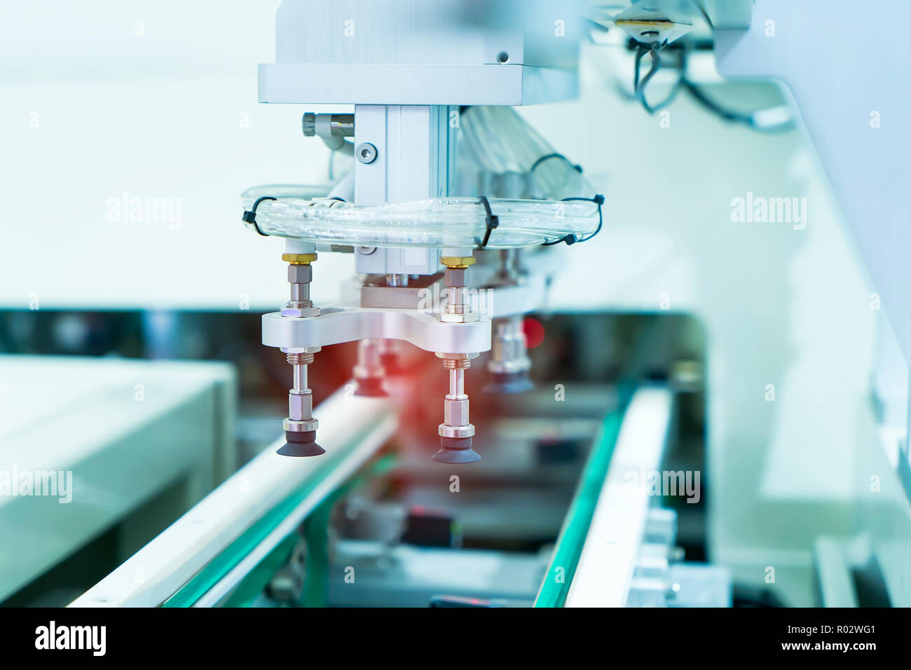 robotic pneumatic piston sucker unit on industrial machine,automation ...