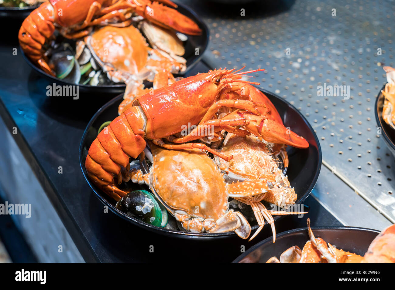 Shellfish plate of crustacean seafood with fresh lobster as an ocean ...