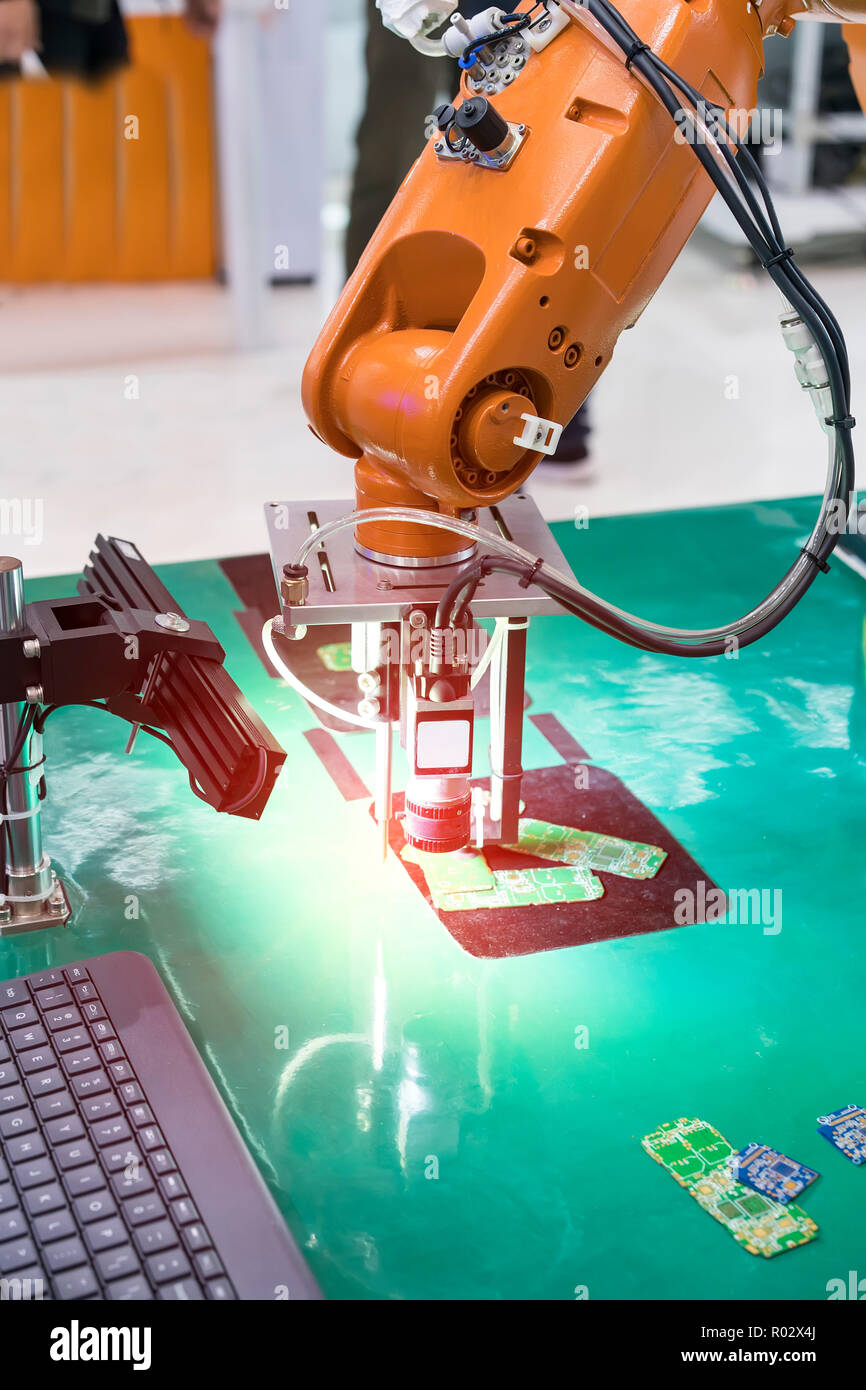 Robotic machine vision system in phone factory Stock Photo - Alamy