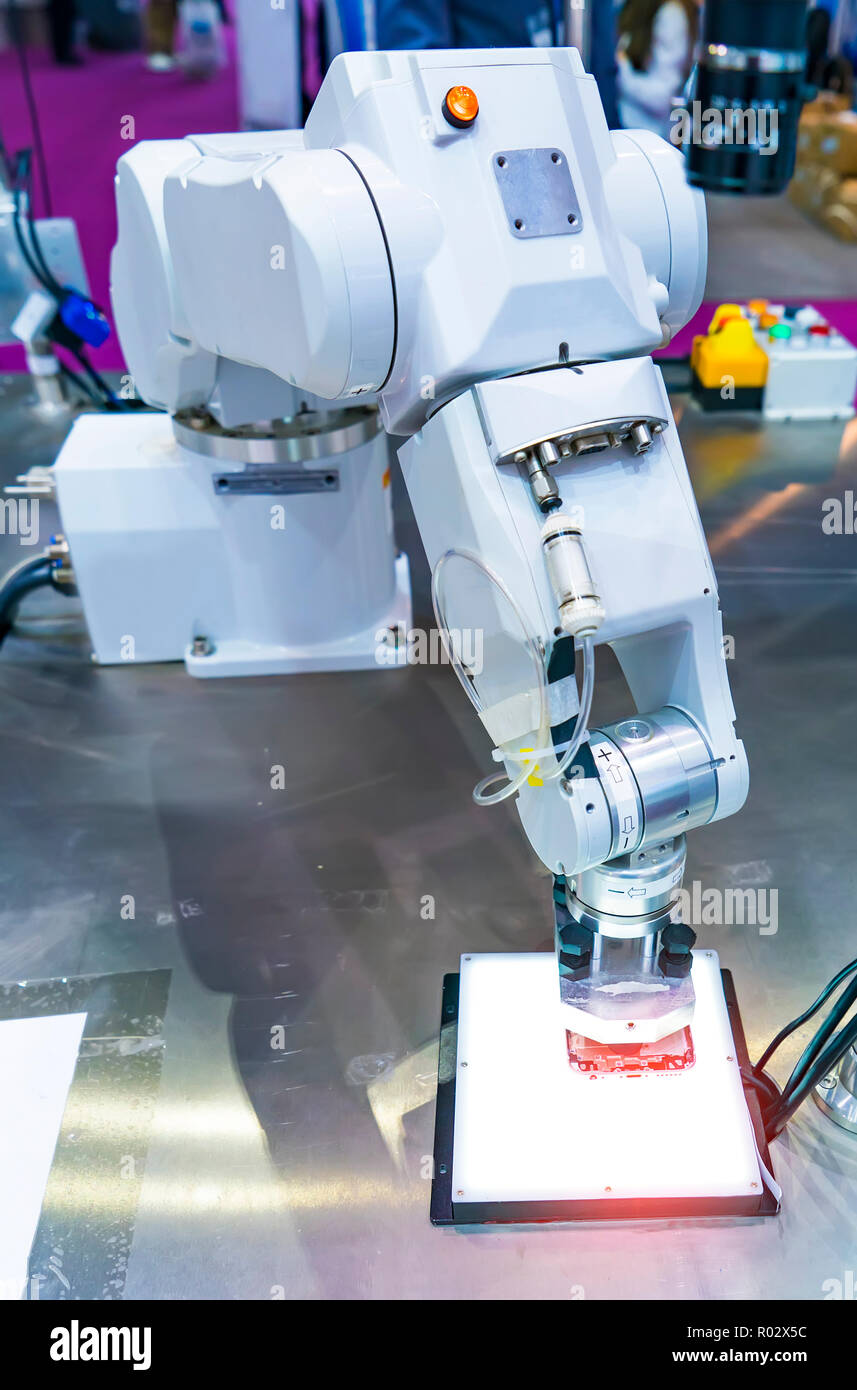 Robotic machine vision system in phone factory Stock Photo - Alamy