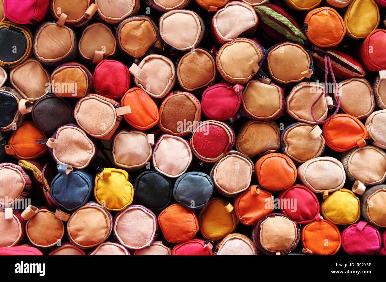 Stack of colourful pencil cases Stock Photo - Alamy
