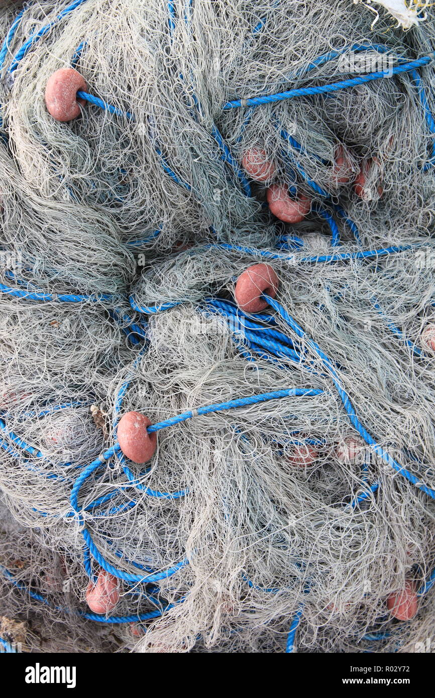 Tangled traditional fishing nets hi-res stock photography and images ...