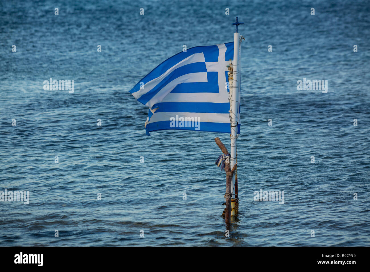 Greek flag in the sea Stock Photo - Alamy