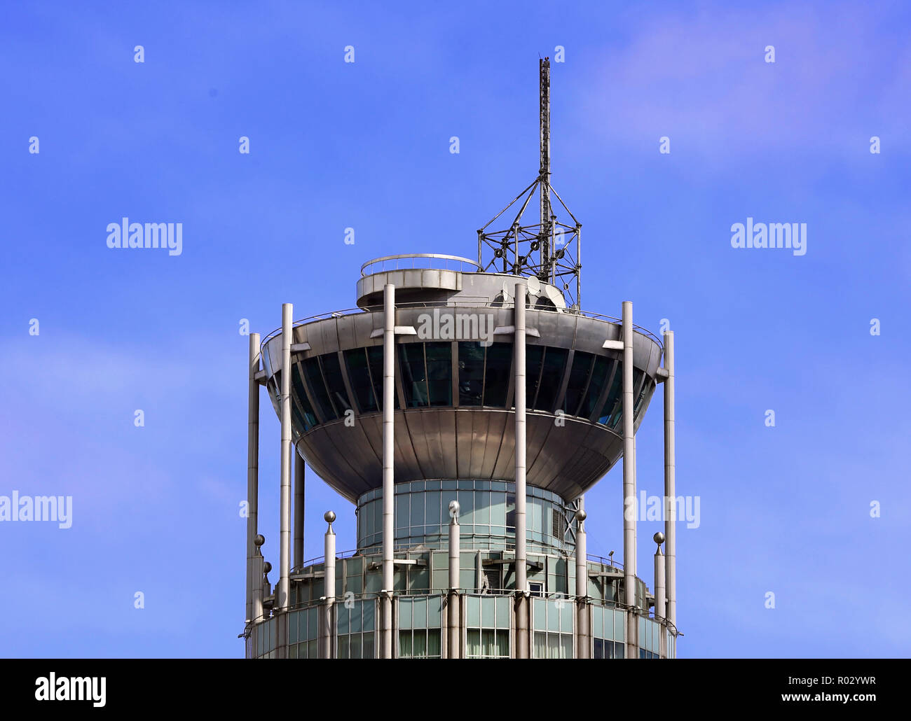 Metallic technical unit with antenna on the top of the high tech ...
