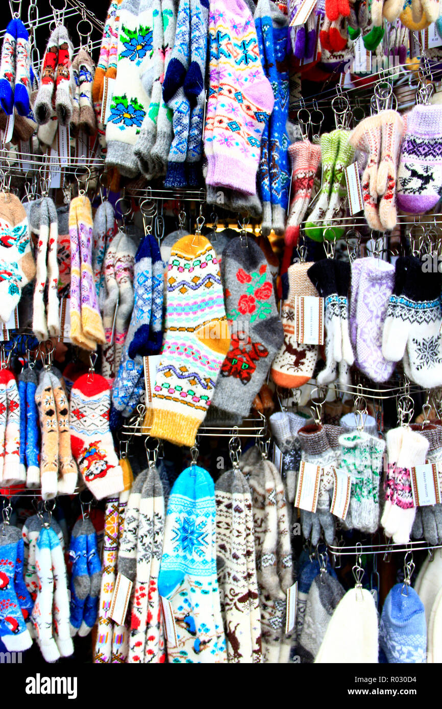 Woolen mittens and socks. Rich choice of winter goods in market of ...