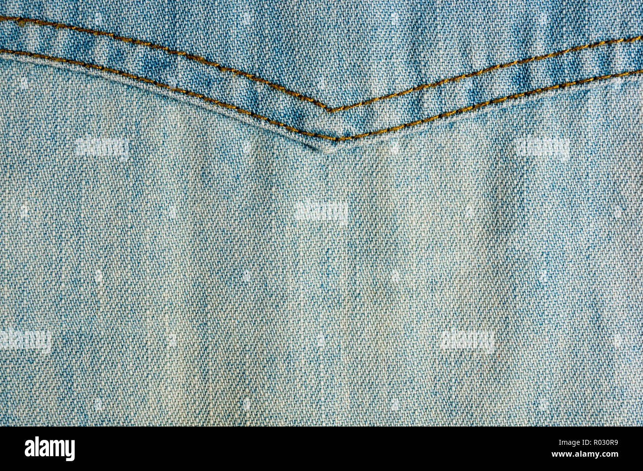 Blue washed faded jeans texture with seams, clothing items, macro ...
