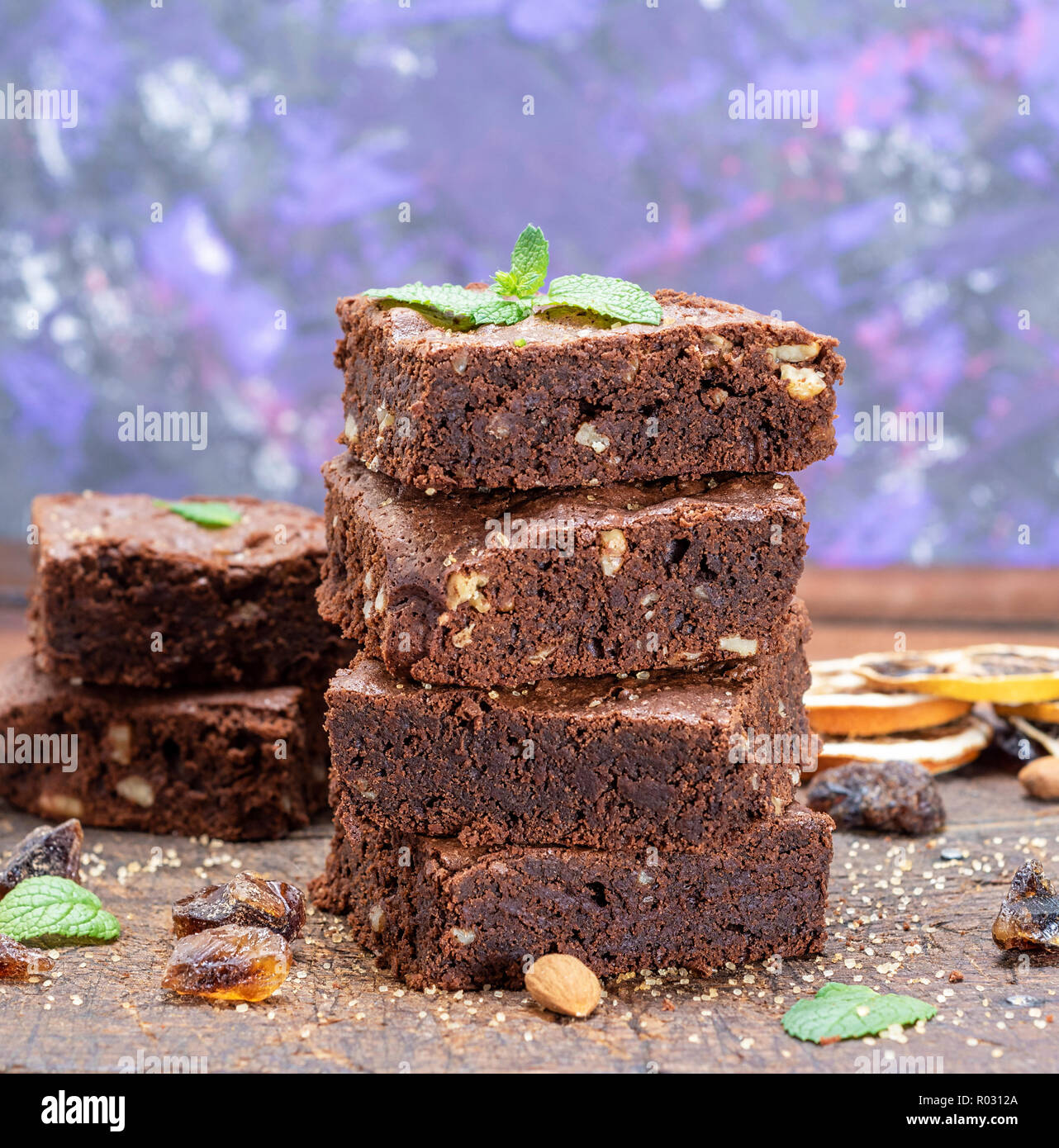 stack of baked square pieces of brownie pie, close up Stock Photo - Alamy