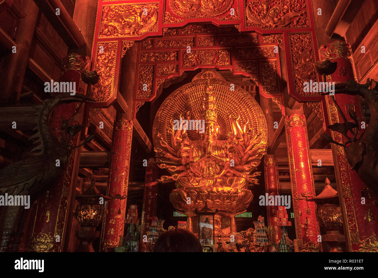 inside of a golden buddhist temple, vietnam Stock Photo - Alamy