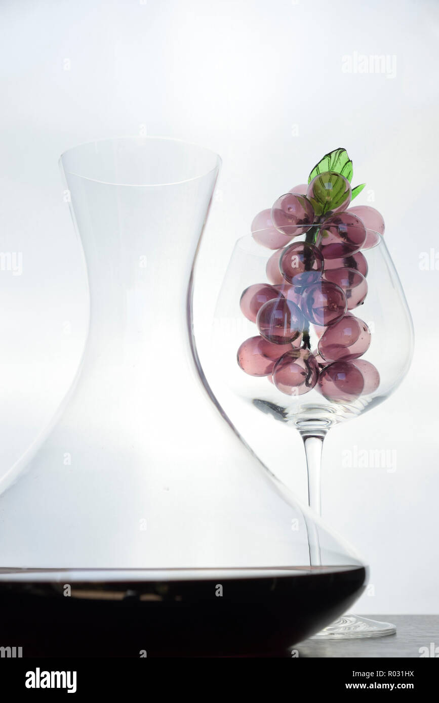 Italian red wine inside the decanter and goblet with decorations Stock ...