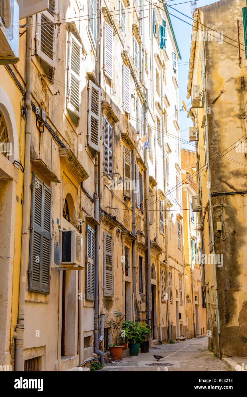 View of typical narrow street of an old town of Corfu, Greece Stock ...