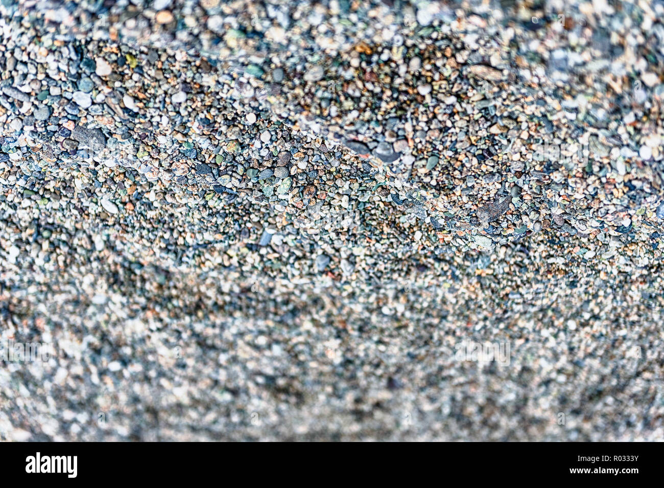Top view of detailed sand texture on a sandy beach, may be used as ...