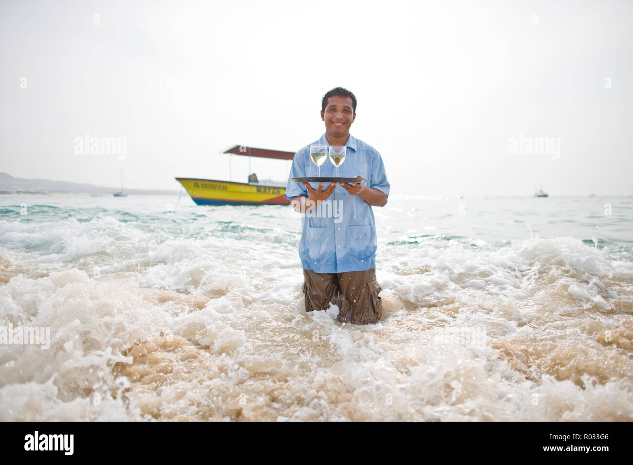 Waiter balancing tray hi-res stock photography and images - Alamy