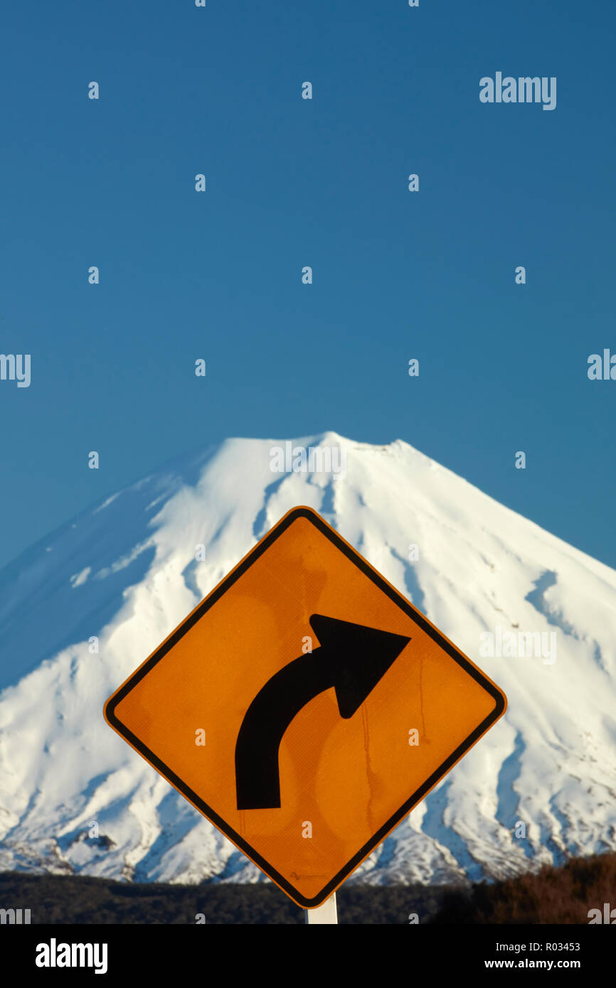Corner sign on Desert Road and Mt Ngauruhoe, Tongariro National Park ...