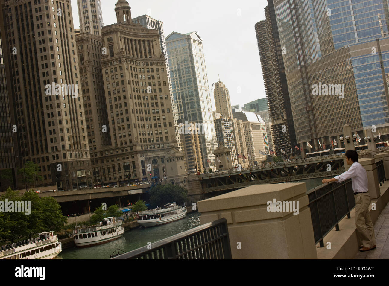Young man standing bridge hi-res stock photography and images - Alamy