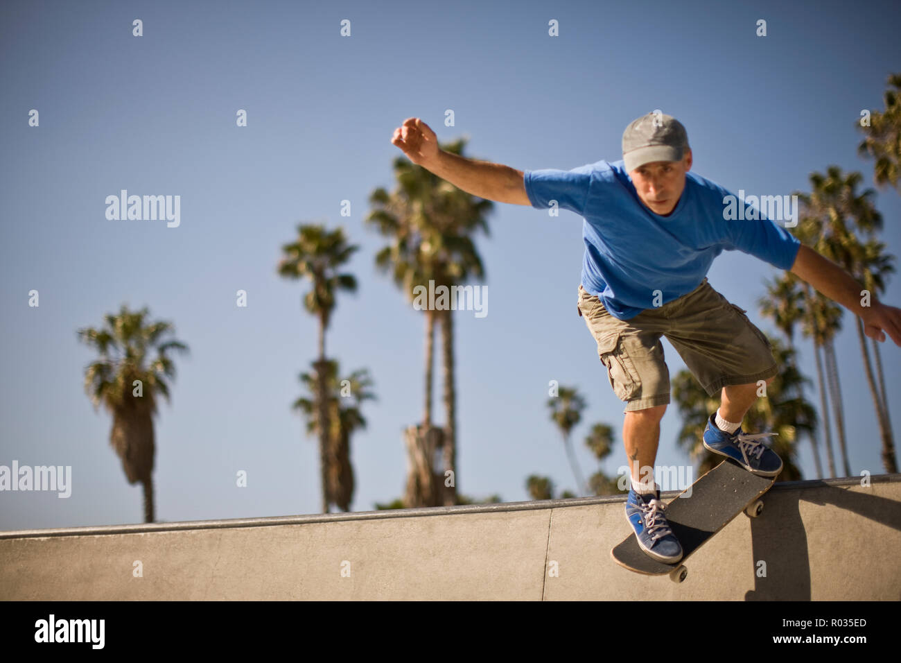 Man about to go down skate ramp Stock Photo - Alamy