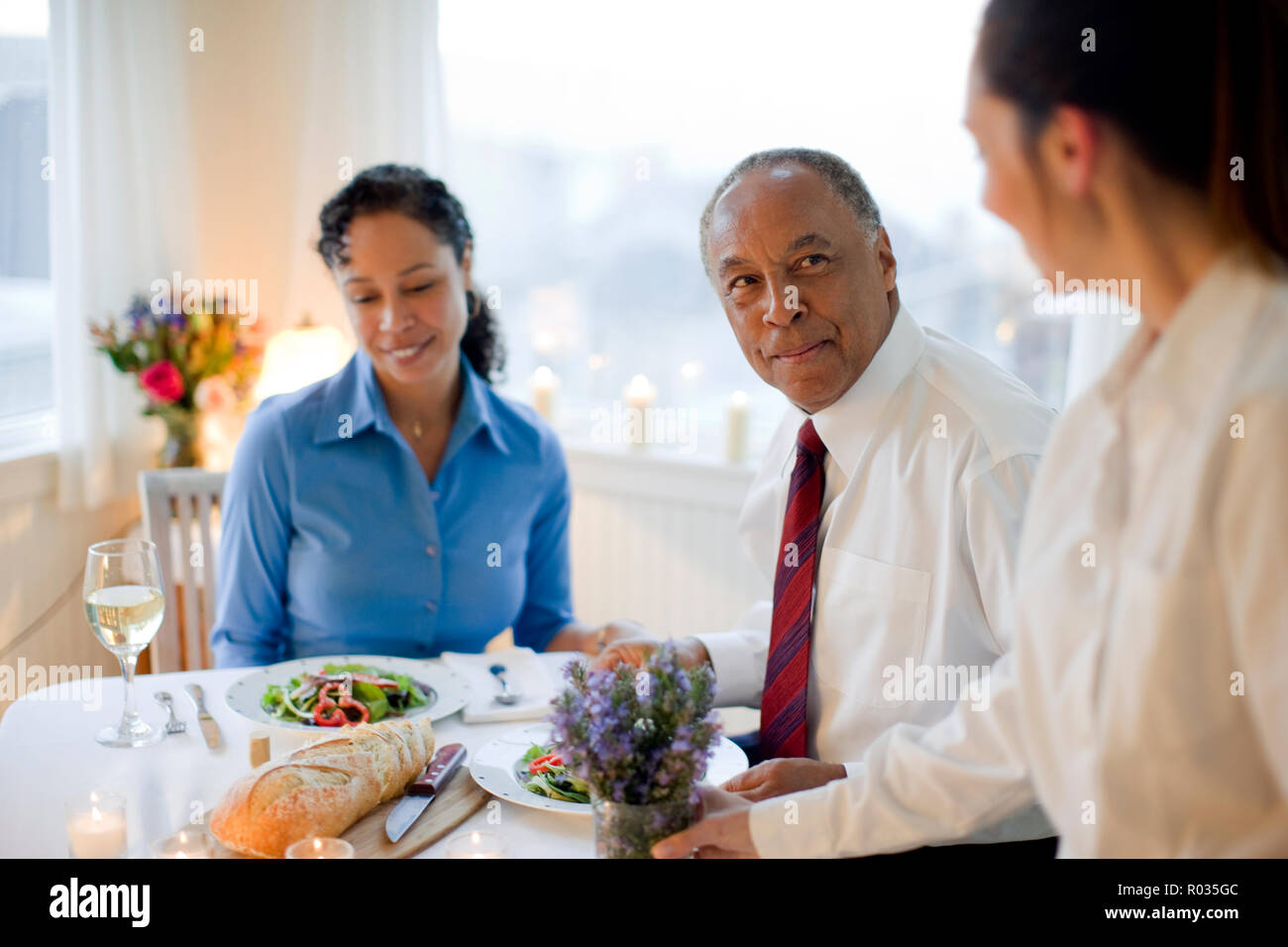 Waitress serving middle aged male hi-res stock photography and images ...
