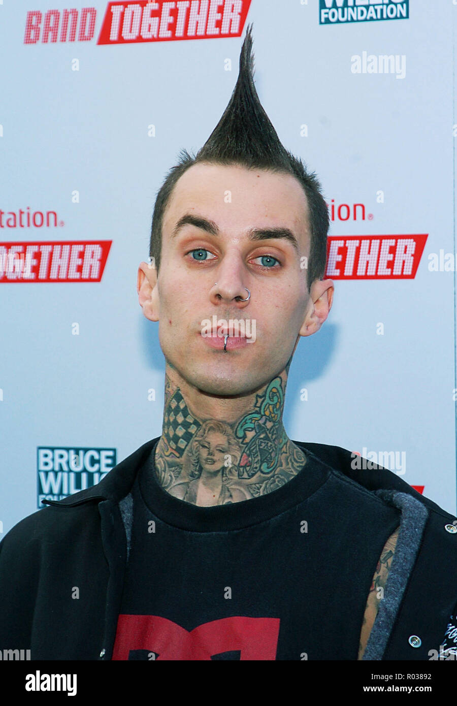 Travis Barker at the Bruce Willis Foundation presenting the Playstation ...