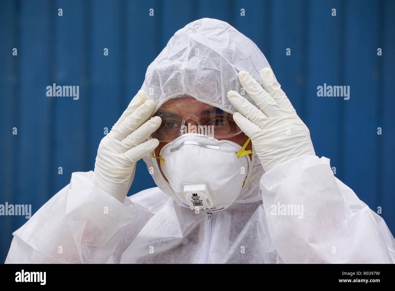 Tuaran Sabah Malaysia-Aug 4,2018 : Veterinary worker wearing personal ...