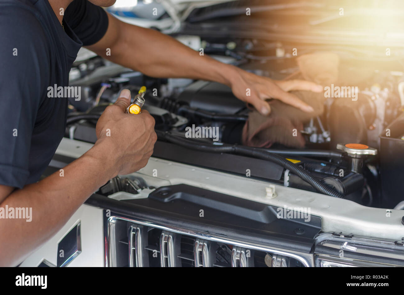 Mans hands checking machine hi-res stock photography and images - Alamy