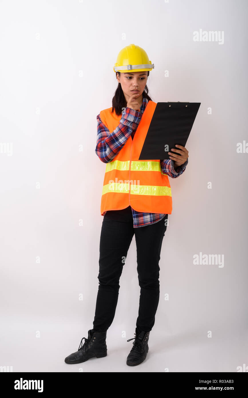 Young woman standing architect looking hi-res stock photography and ...