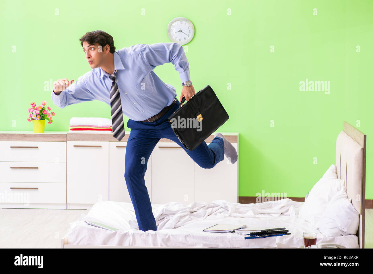 Young businessman employee late for office Stock Photo - Alamy