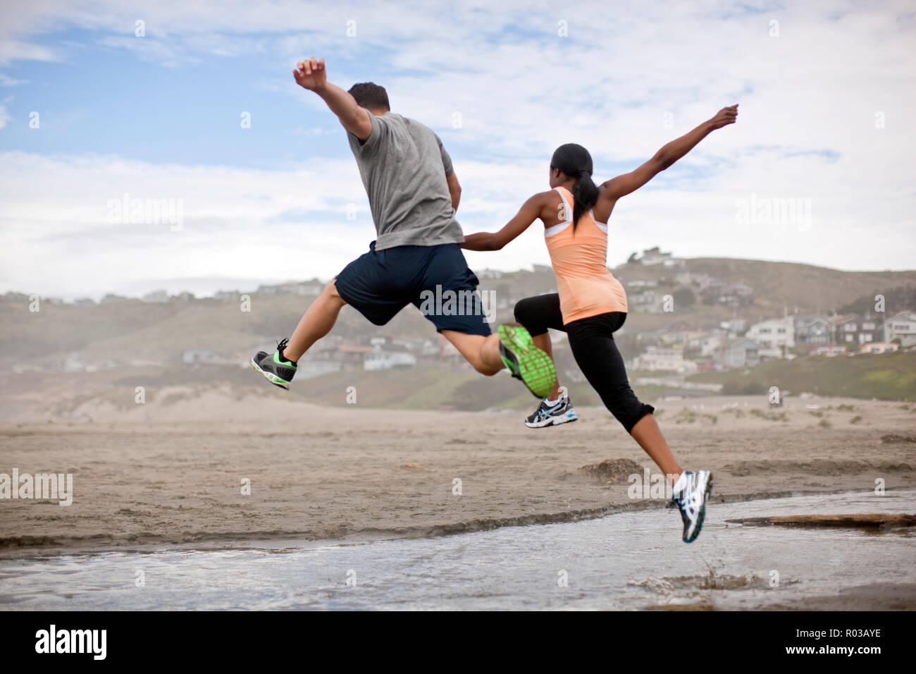 Hold hands and jump and water hi-res stock photography and images - Alamy