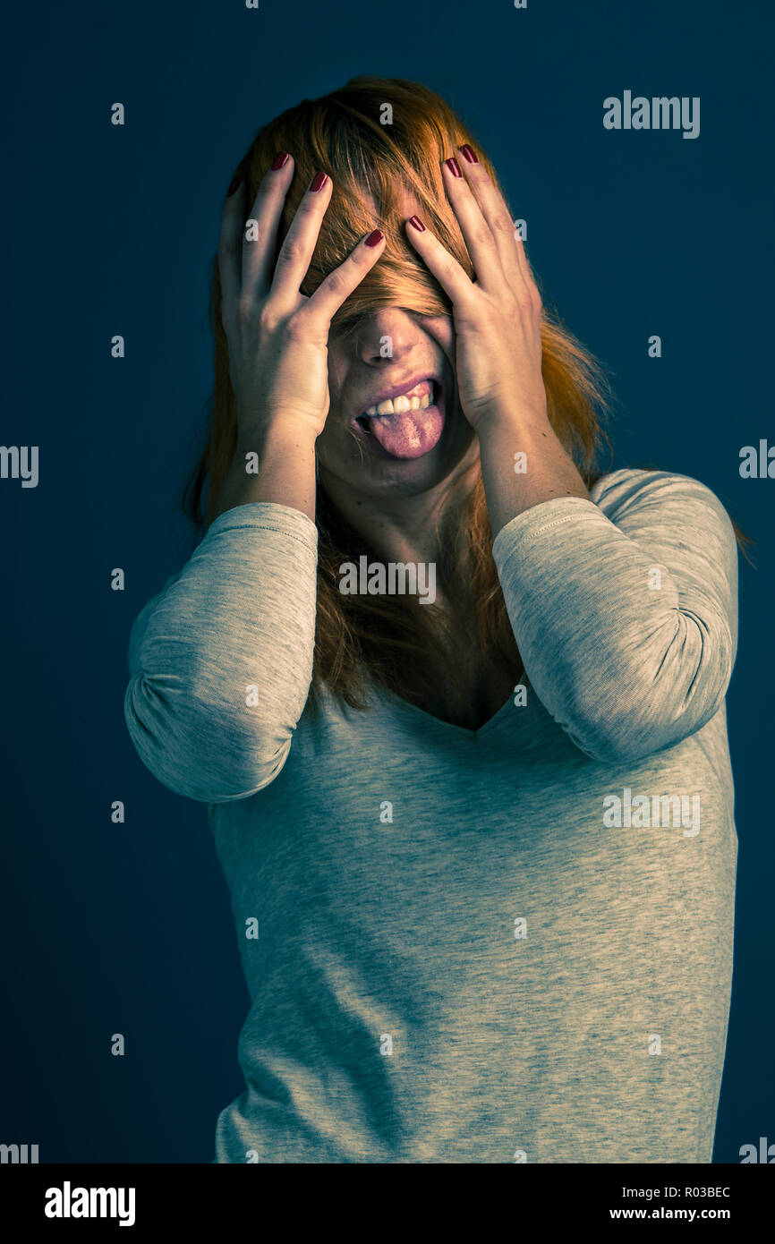 Grimace facial expression hi-res stock photography and images - Alamy
