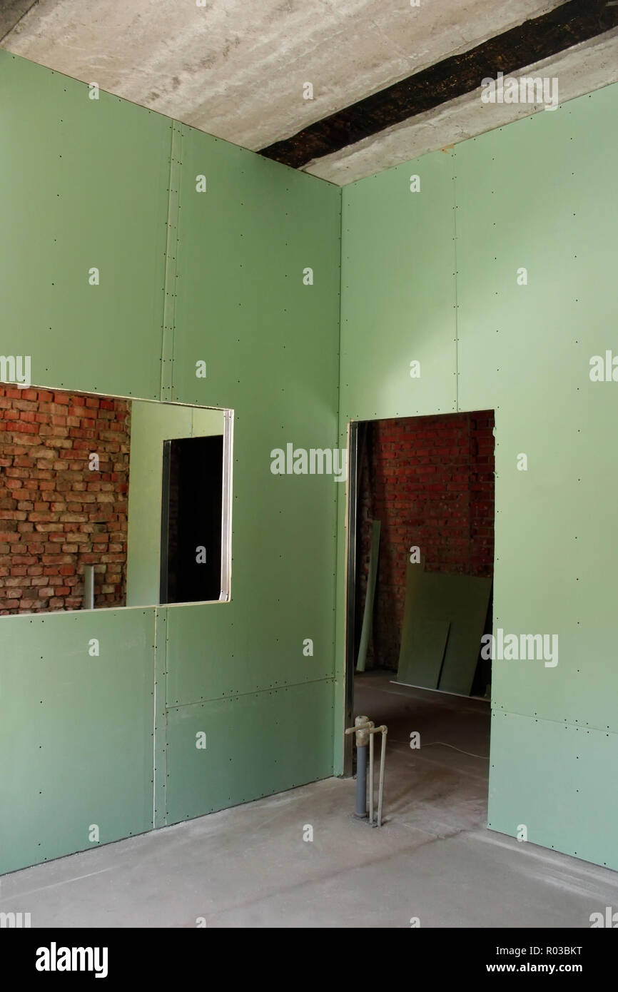 Reconstruction interior of the house. Established of plasterboard ...