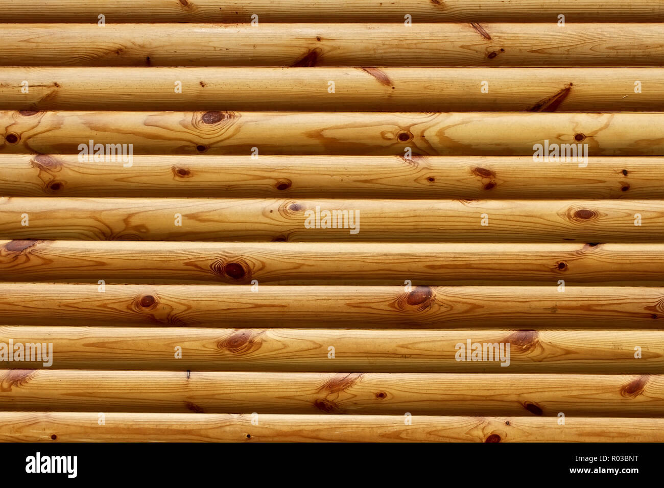 Shield with a large number of parallel polished wooden logs Stock Photo ...