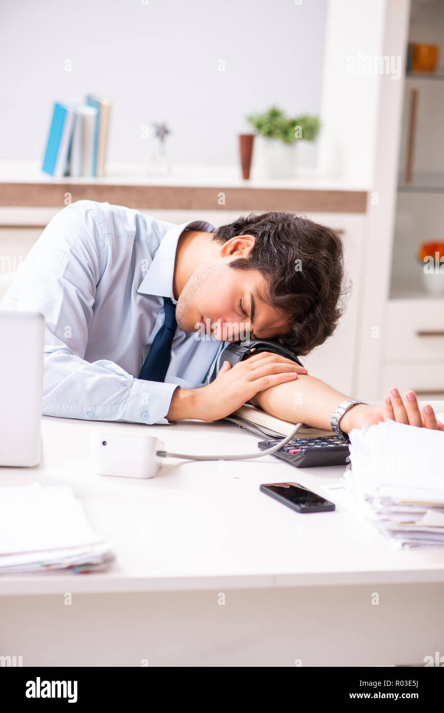 Man under stress measuring his blood pressure Stock Photo - Alamy