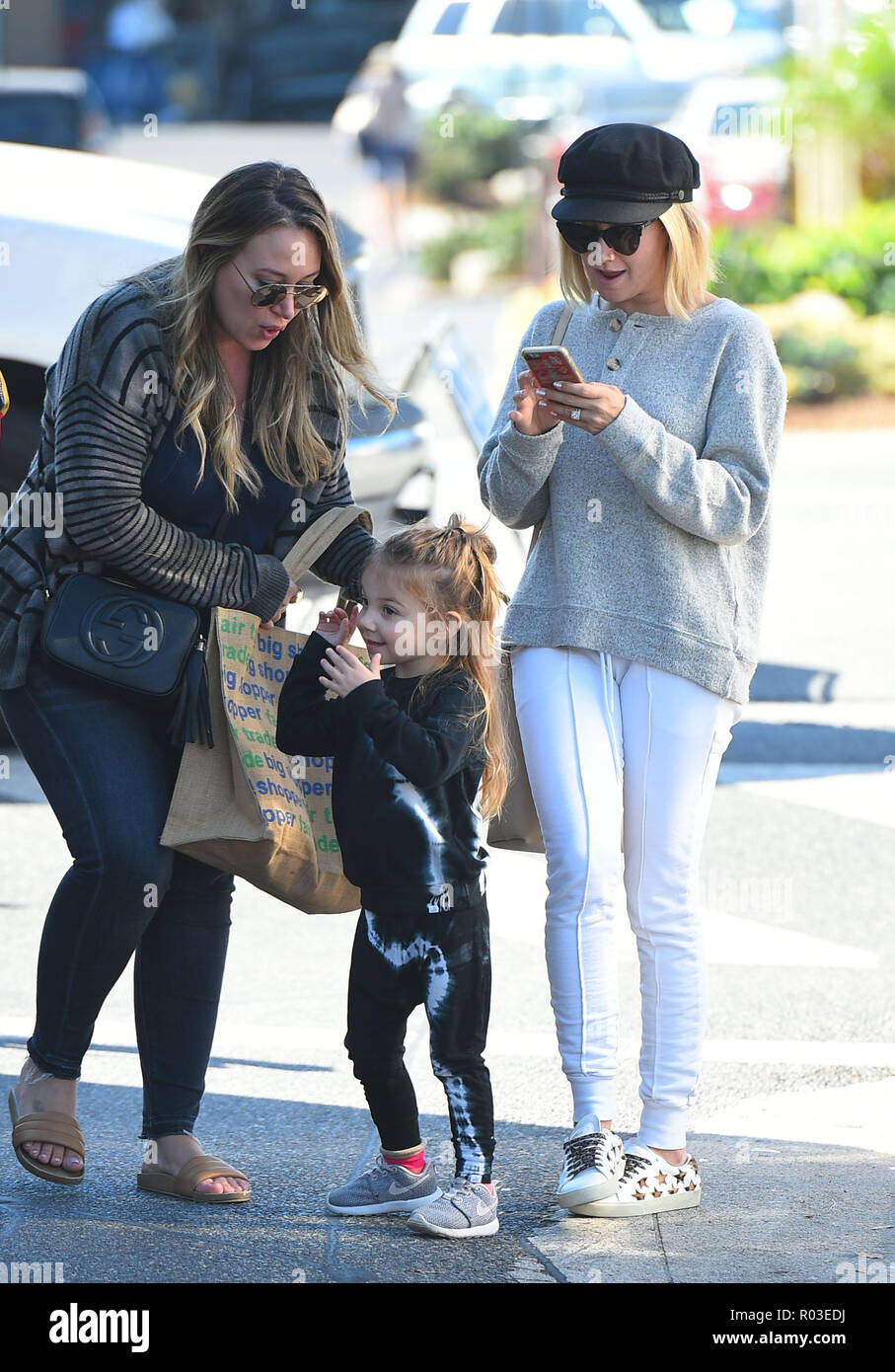 Ashley Tisdale goes to the farmers market with Haylie Duff and her daughter Ryan Rosenberg ...